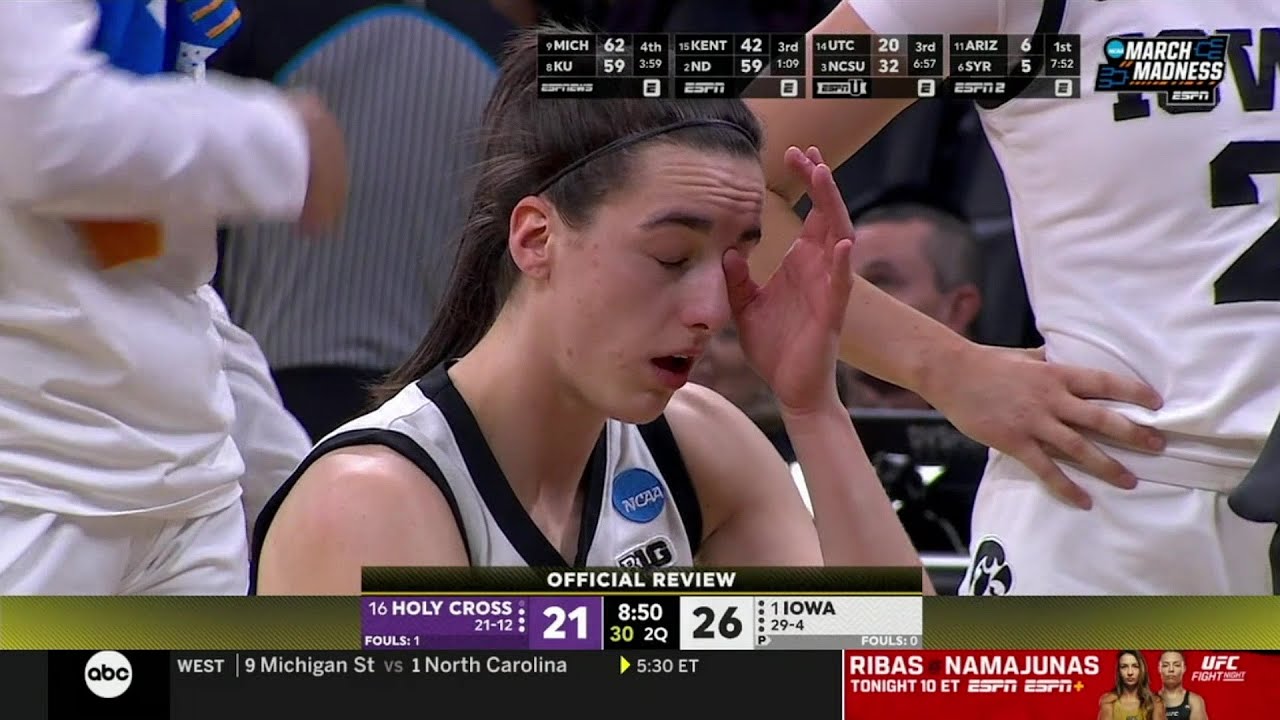 Fans draw wild conclusions as Iowa star gets elbowed by Holy Cross guard Bronagh Power-Cassidy ...